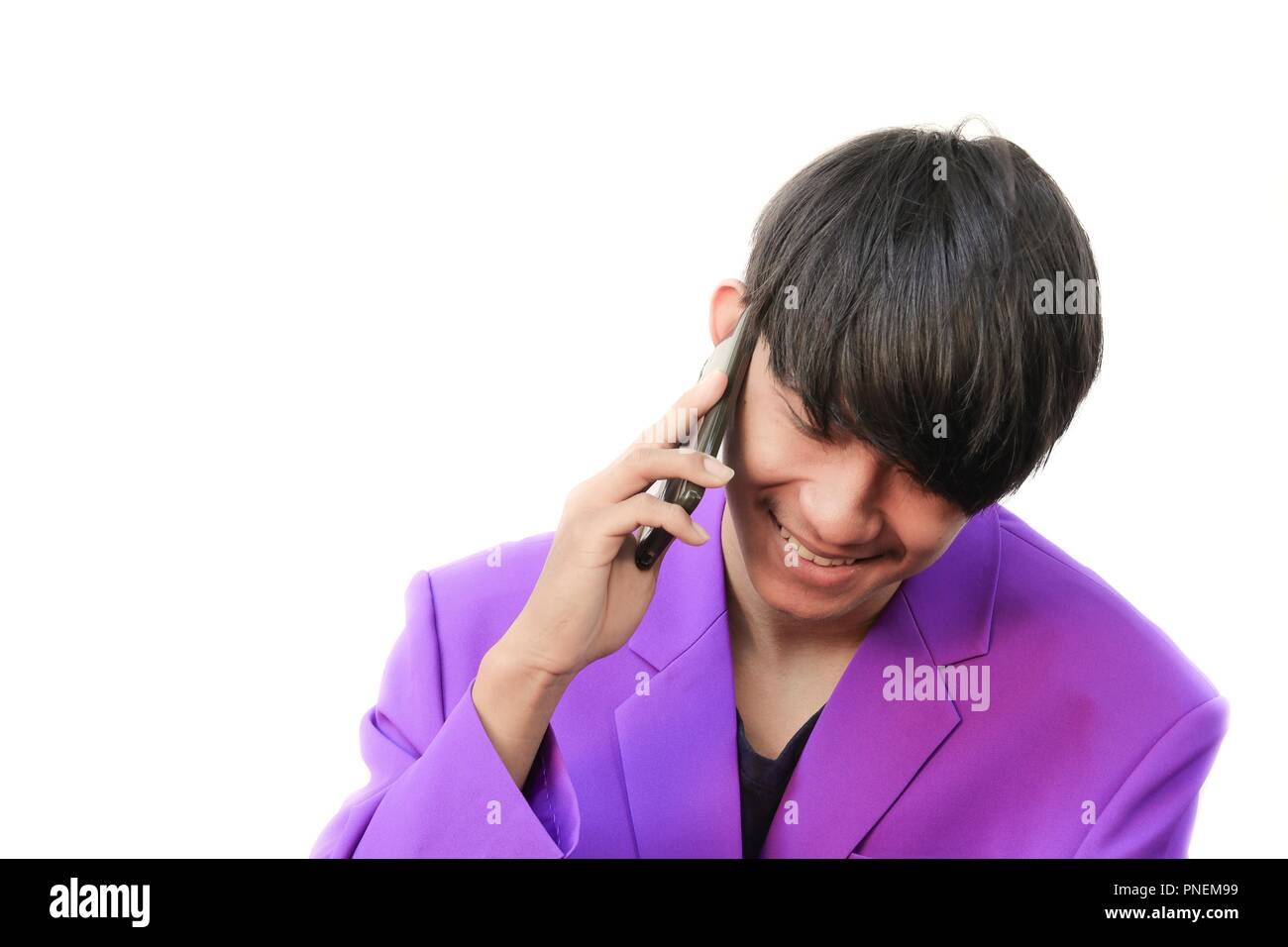 Young handsome business man making a phone call on white background ...
