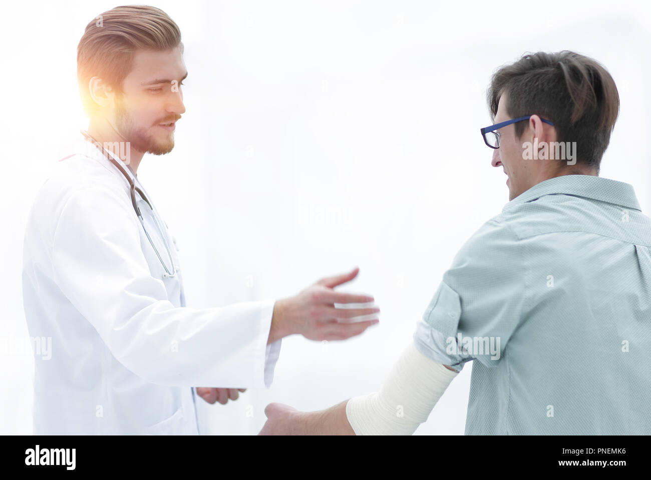 doctor explaining a patient Stock Photo - Alamy