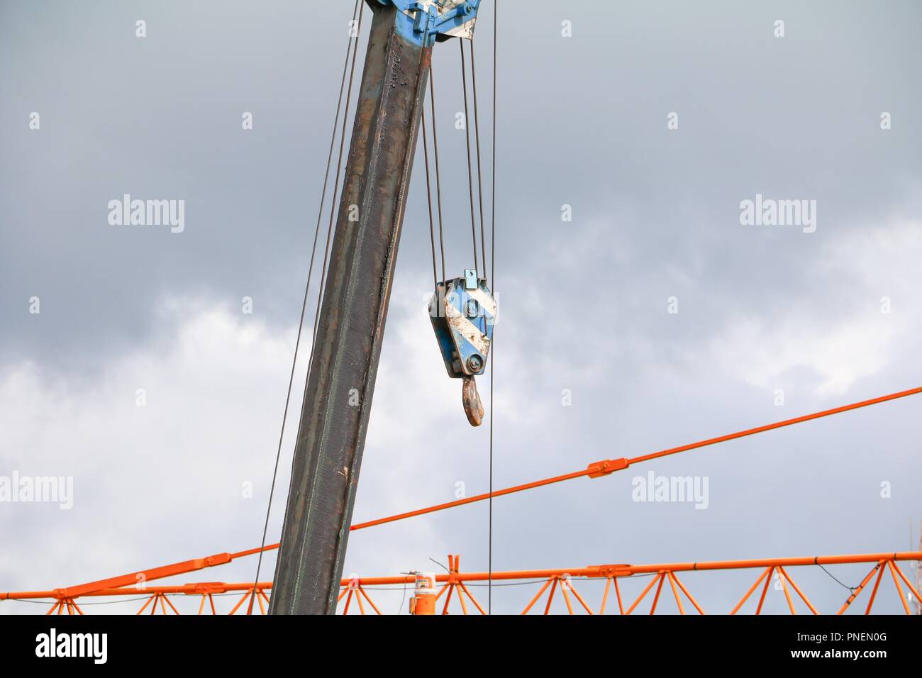Crane Hook industry in Construction buildings Stock Photo - Alamy