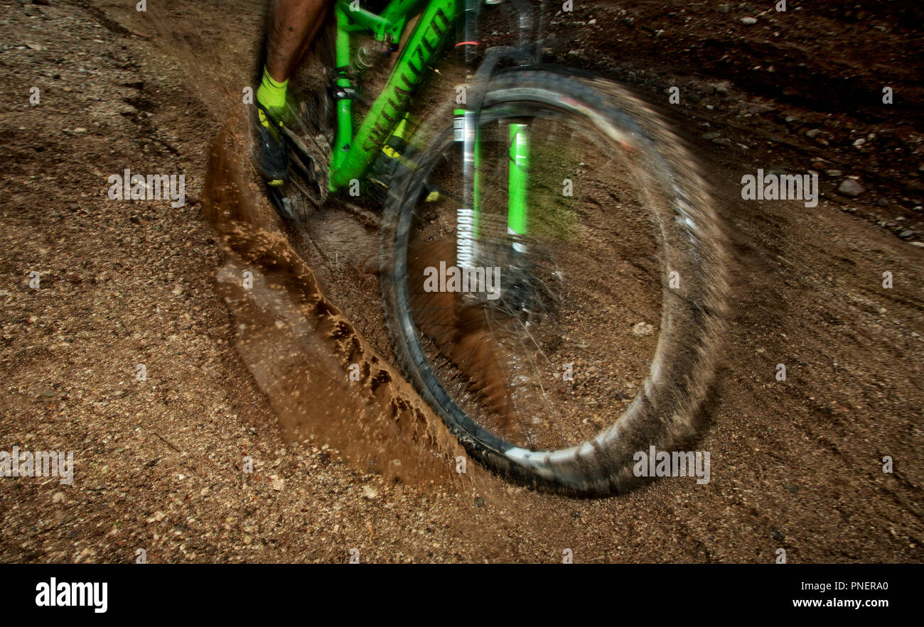 Cycling through puddles hi-res stock photography and images - Alamy