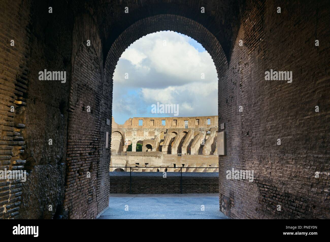 Archway in Colosseum, the world known landmark and the symbol of Rome ...