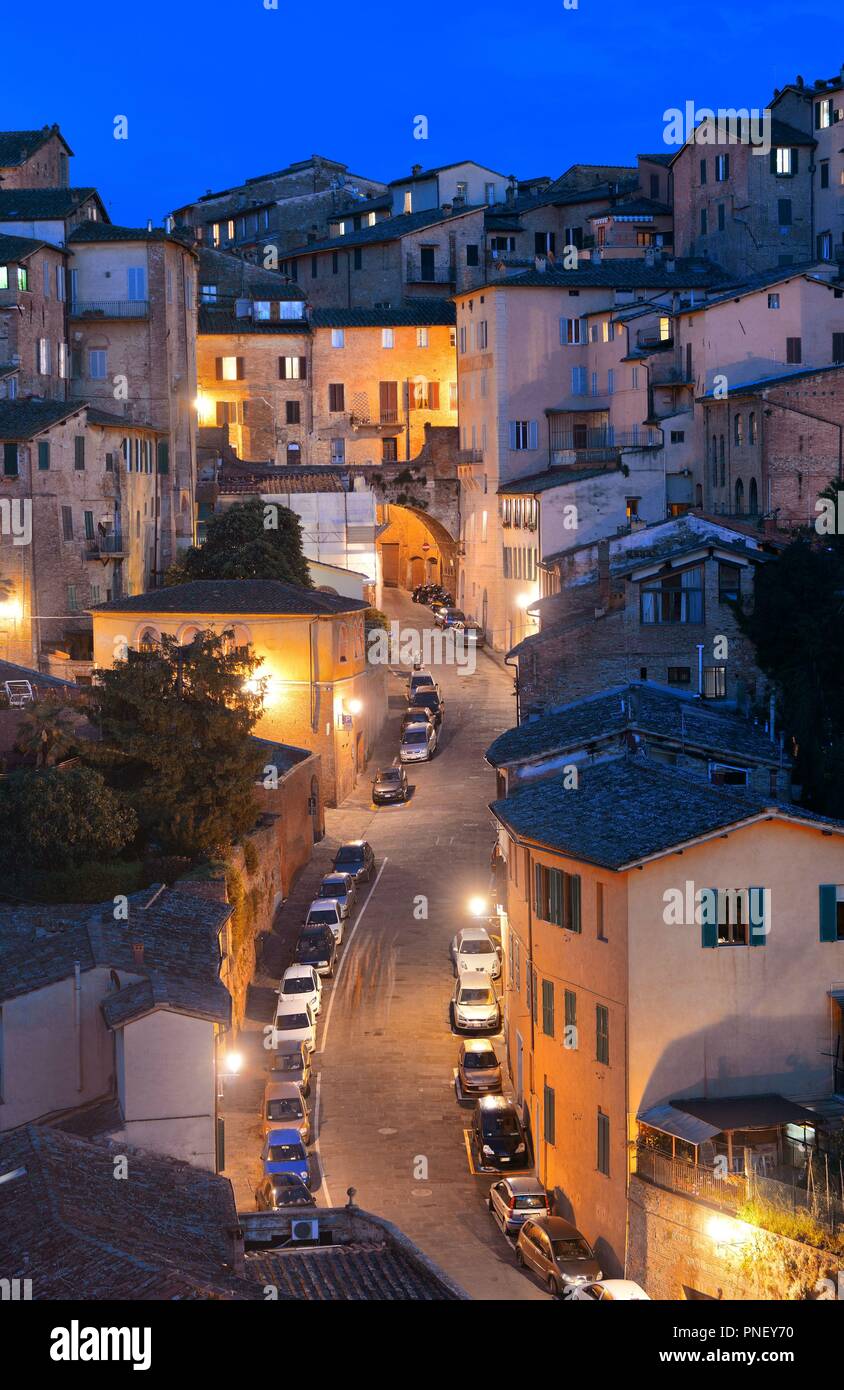Old medieval town Siena in Italy at night Stock Photo - Alamy