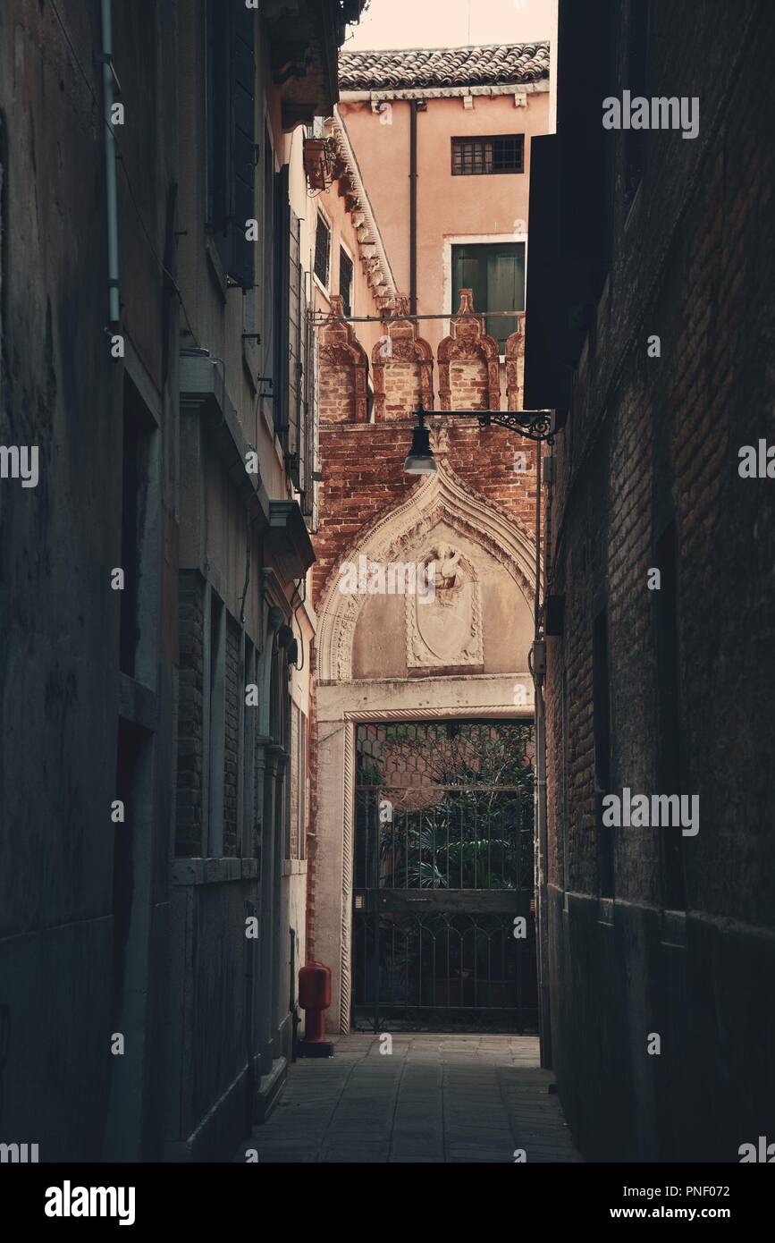 Alley view with historical buildings in Venice, Italy Stock Photo - Alamy