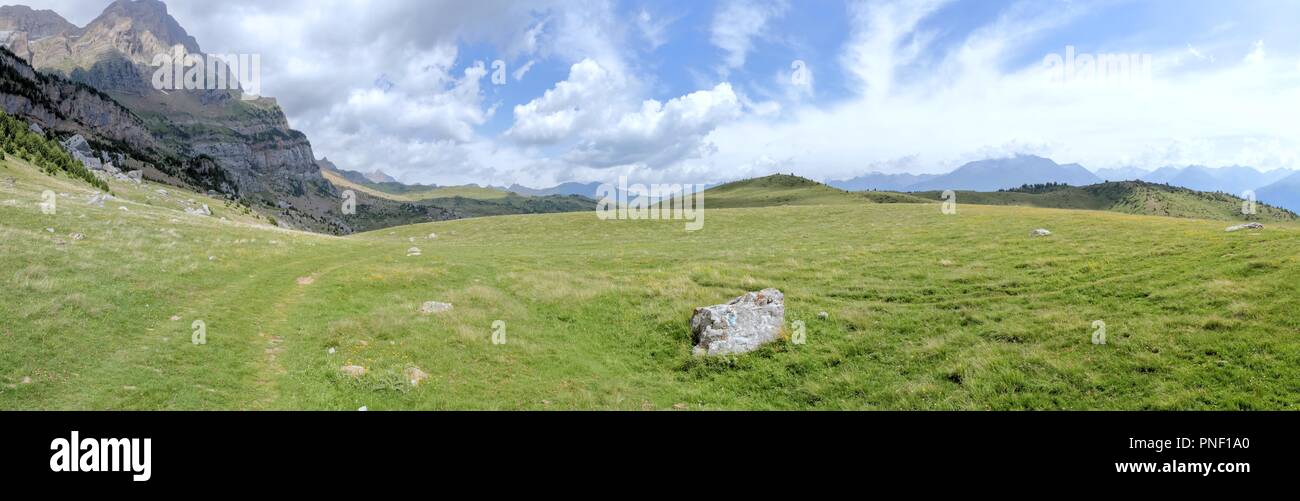 The mountains and the massif along the green path to the Piedrafita de ...