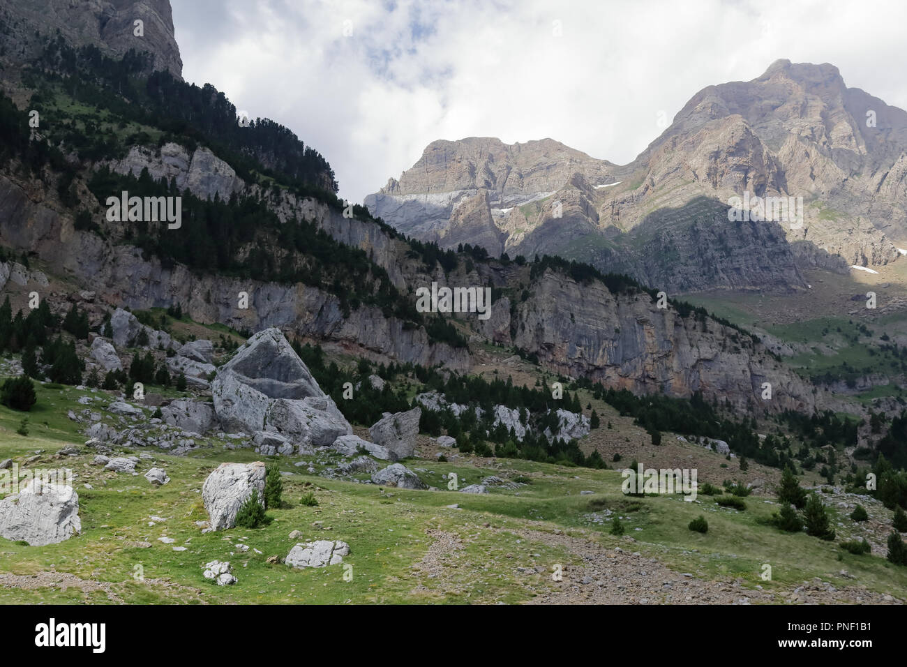 The mountains and the massif along the green path to the Piedrafita de ...