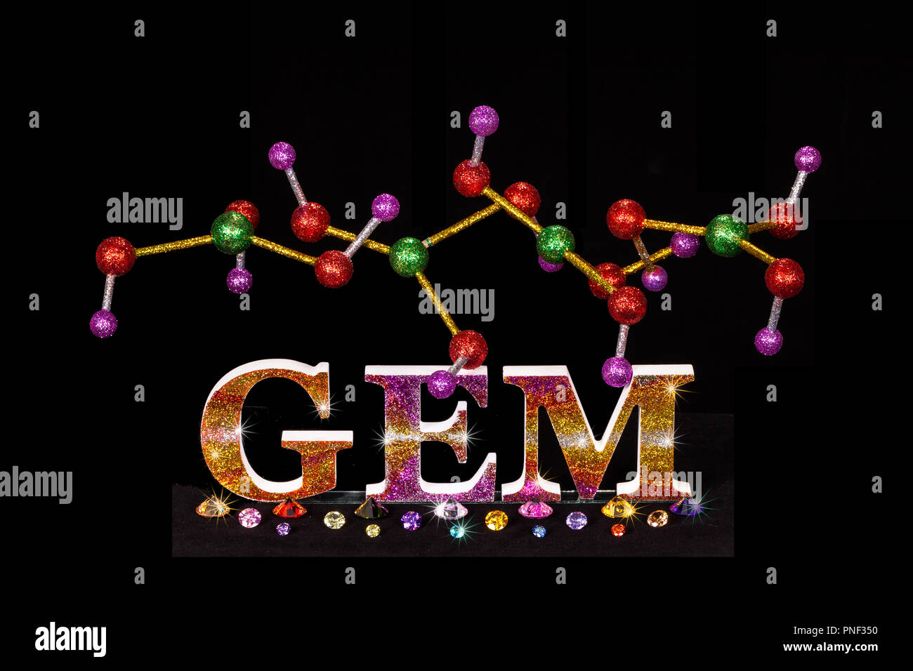glitter gem letter and gem stones with construction of gem in black ...