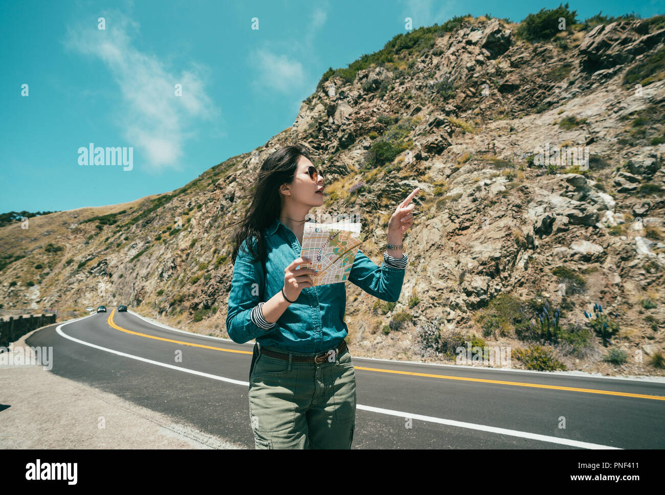 Finger pointing route on map hi-res stock photography and images - Alamy