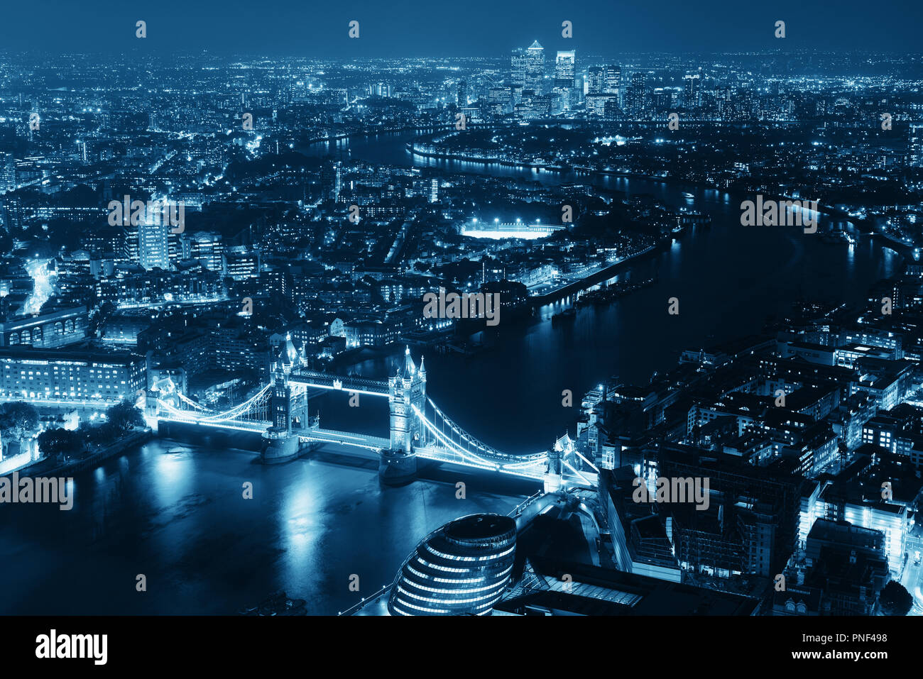 London aerial view panorama at night with urban architectures and Tower ...