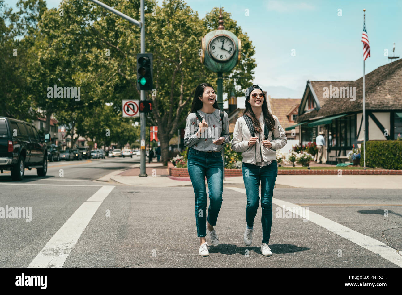 beatiful girls hanging out together and laughing happily while taking a ...