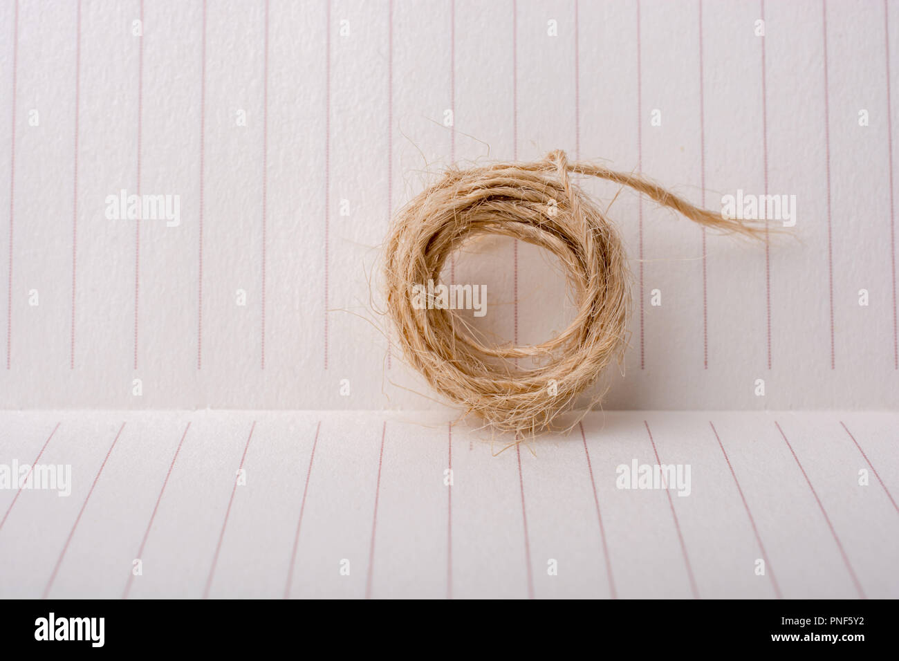 Roll of brown color linen string paper background Stock Photo - Alamy