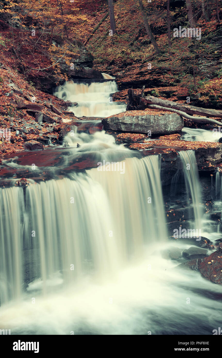 Autumn waterfalls in park with colorful foliage Stock Photo - Alamy