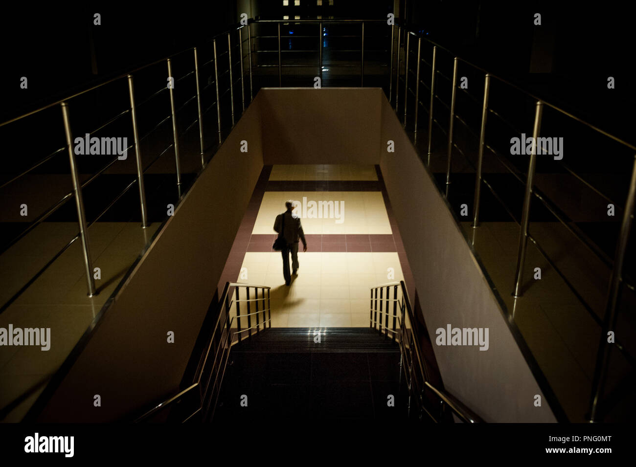 Man coming down stairs hi-res stock photography and images - Alamy