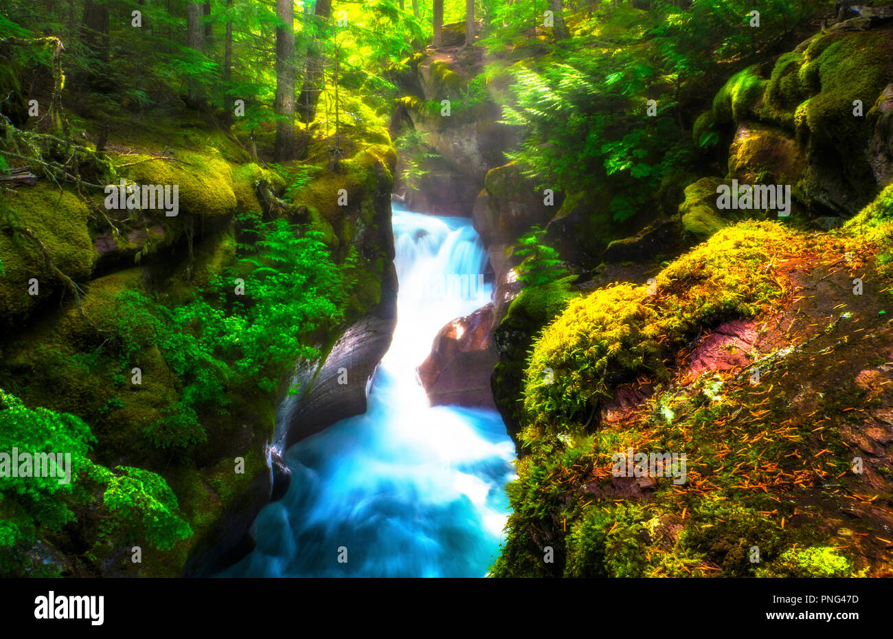 Glacier waterfall with clear, blue, soft, water flows through deep ...