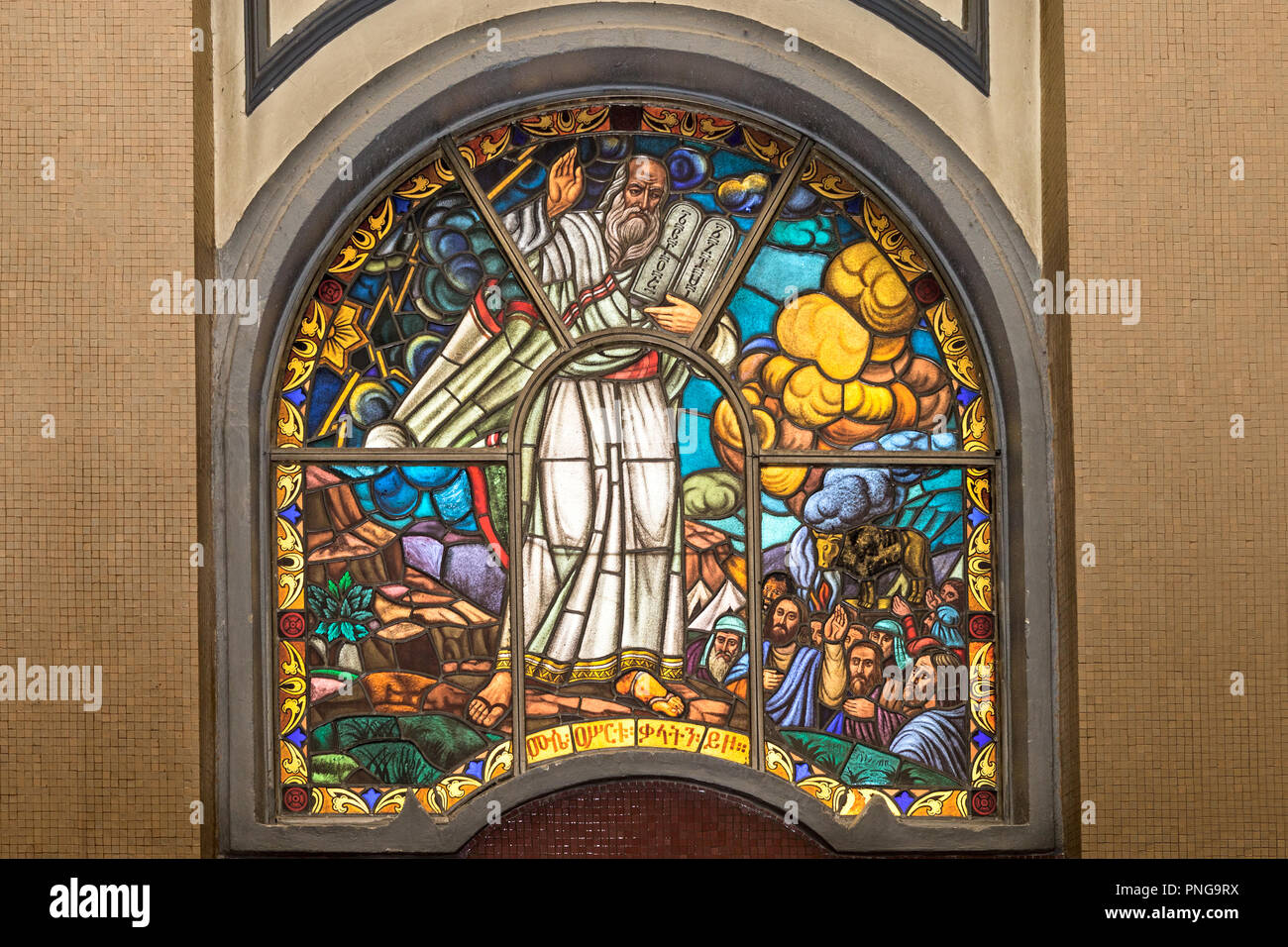 Interior stained glass window: Moses receiving the Ten Commandments ...