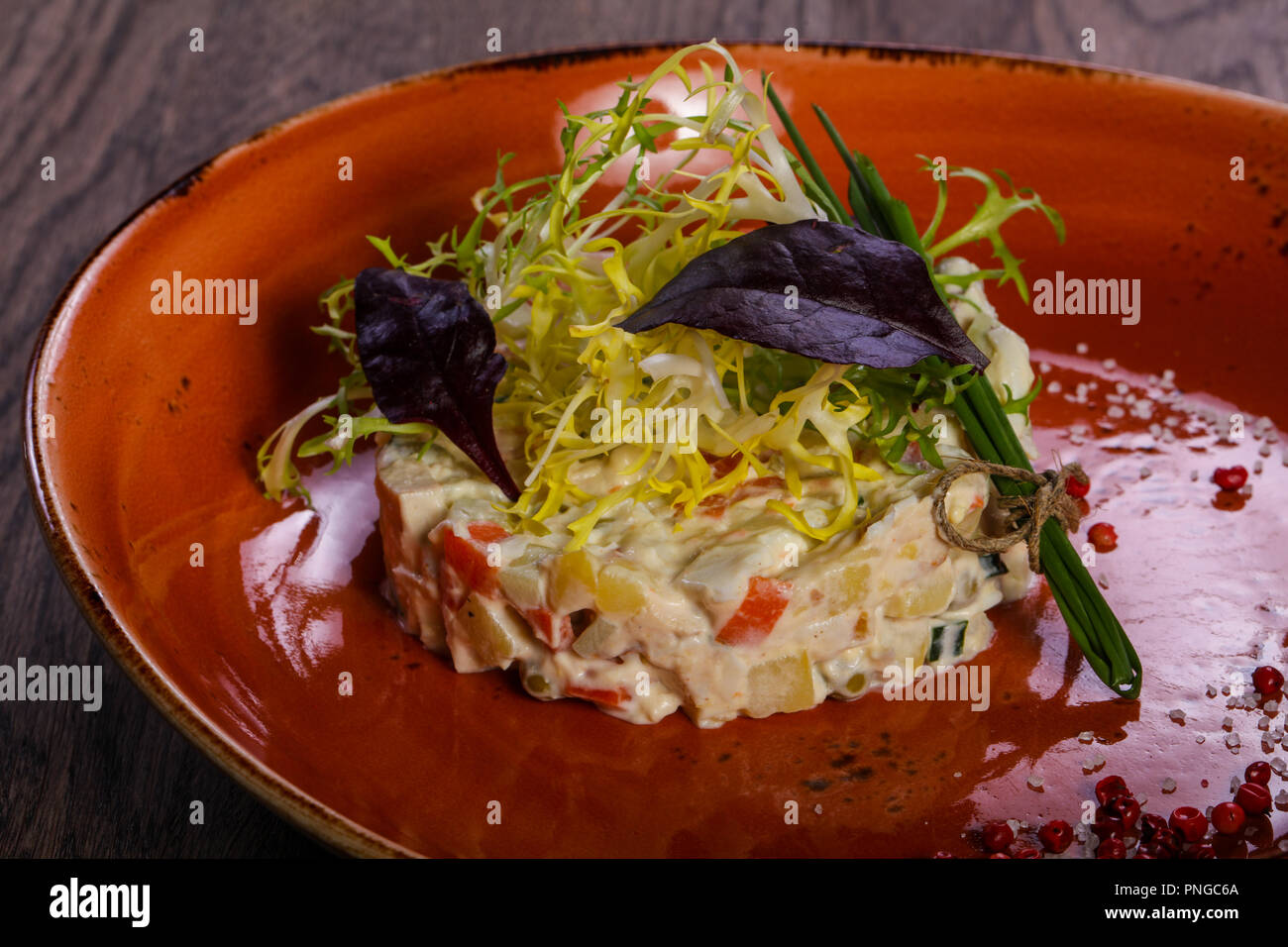 Traditional Russian salad with mayonaise Stock Photo - Alamy