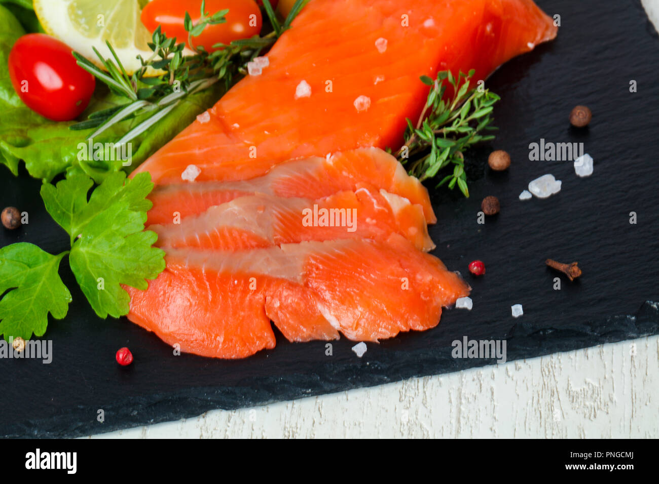 Raw trout fillet with salt and spices Stock Photo - Alamy