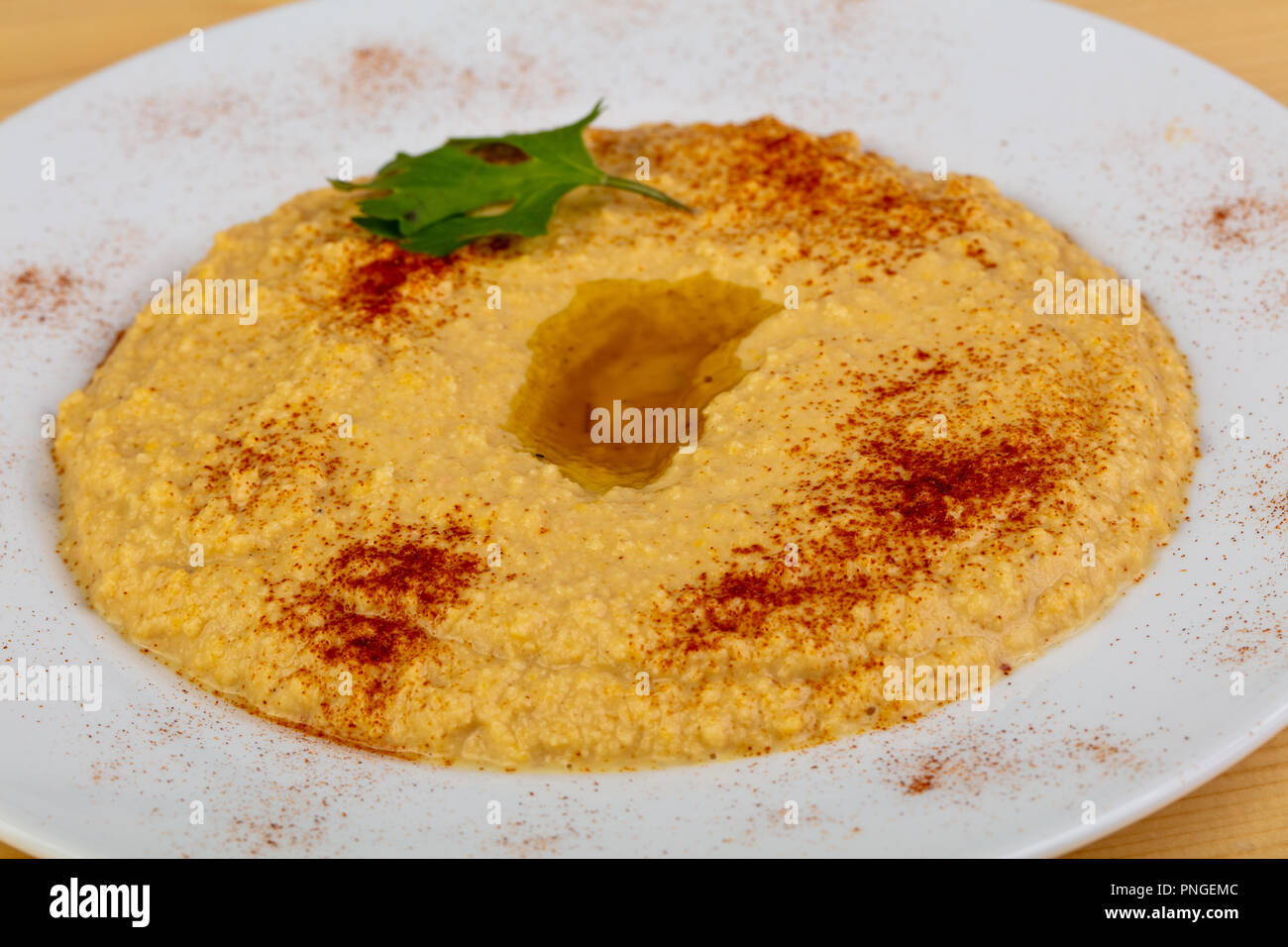 Gurmet humus with paprica and olive oil Stock Photo - Alamy