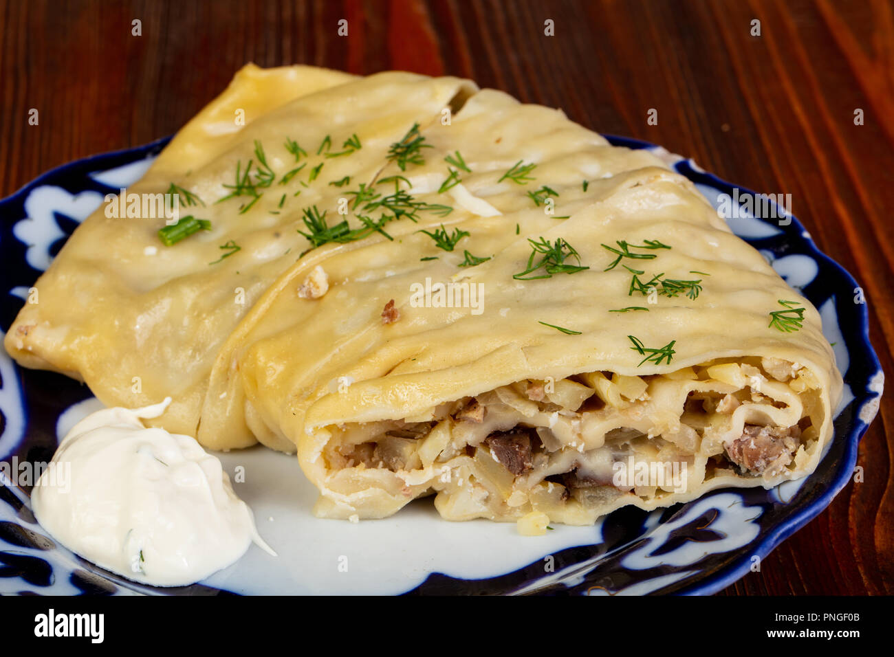 Traditional uzbek Hanum wiht meat Stock Photo - Alamy