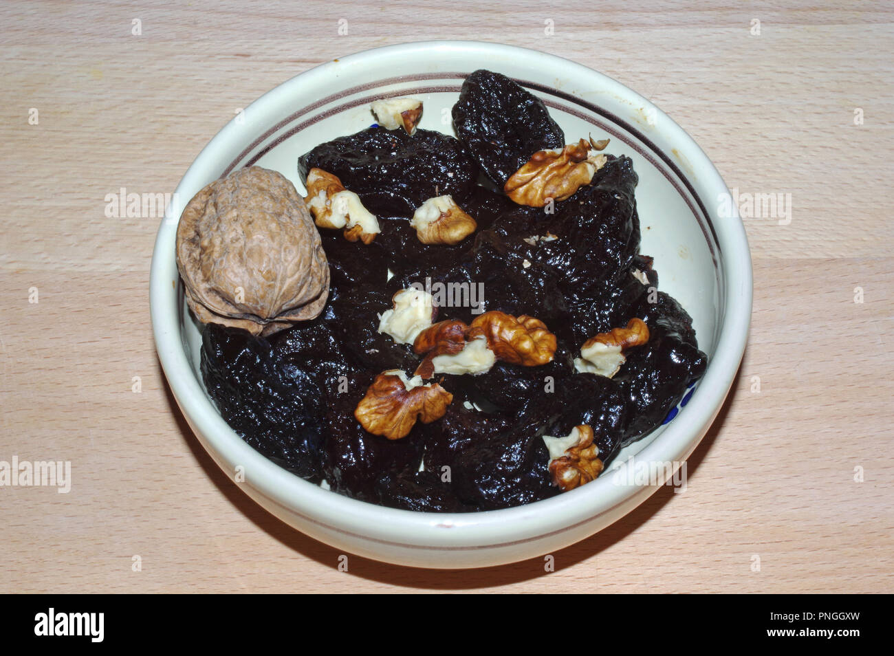 Dry plums hi-res stock photography and images - Alamy