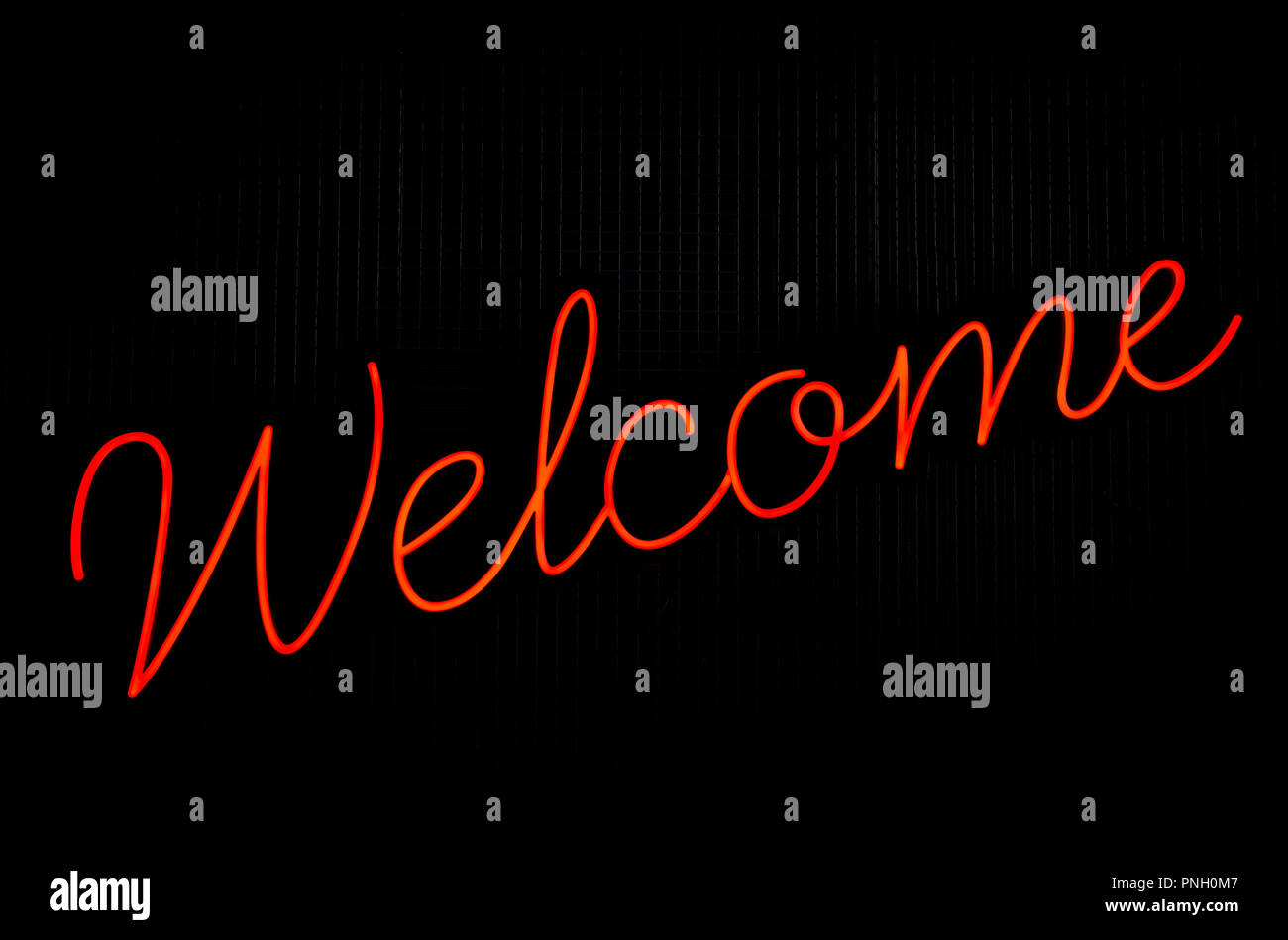 Red neon 'Welcome' sign Stock Photo - Alamy
