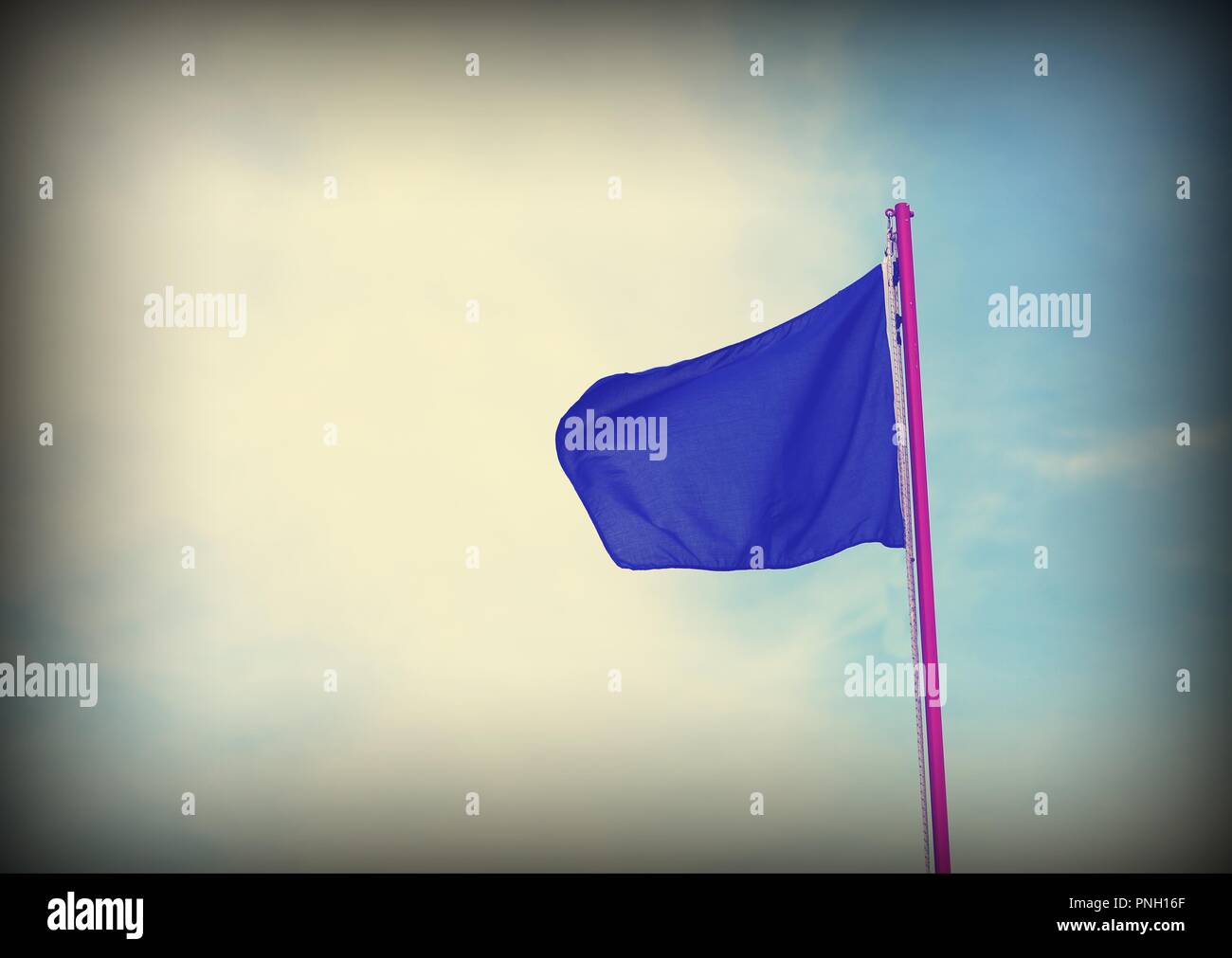 blue flag is symbol of not pollution in this area wtih vintage old ...