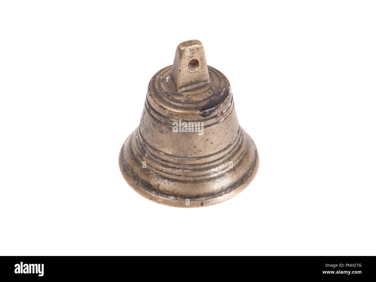 Ancient bell on a white background close-up Stock Photo - Alamy
