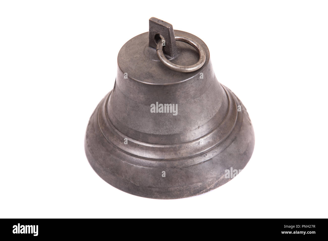 Ancient bell on a white background close-up Stock Photo - Alamy
