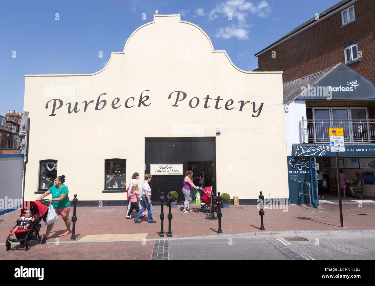 Purbeck Pottery, old historic buildings on quayside at Poole harbour ...
