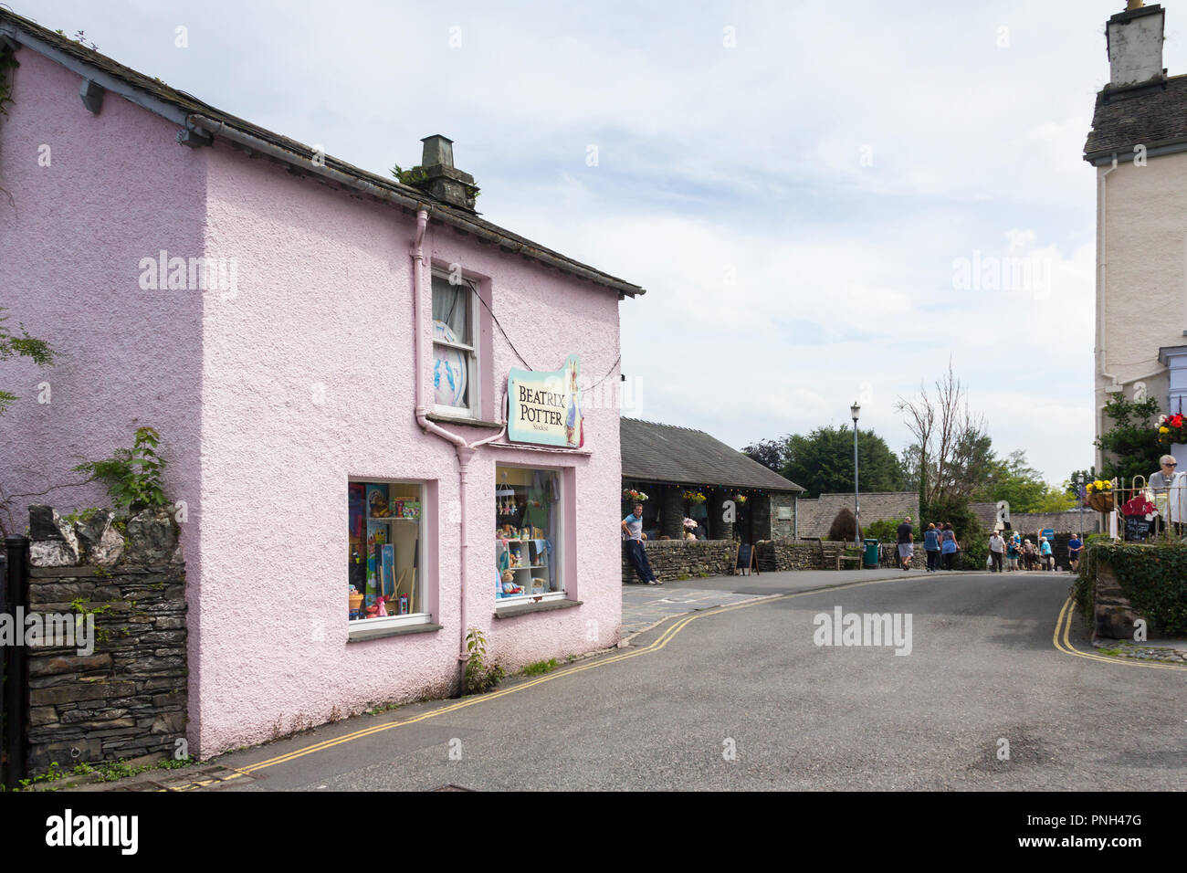 Main Street in the village of Hawkshead in Cumbria with Grahams of ...