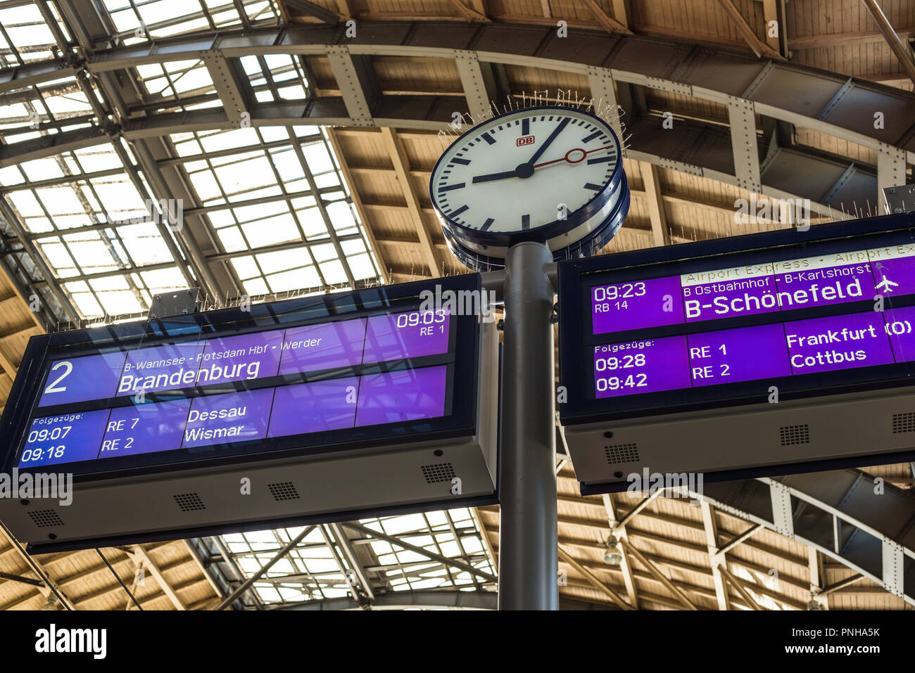 Berlin, Germany - May 28, 2017: Clock and train departure timetable ...