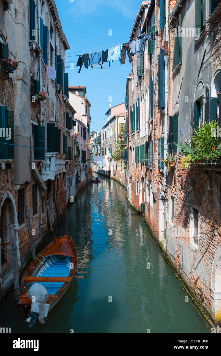 Canal and clothes drying on high washing line in Venice, Italy Stock ...