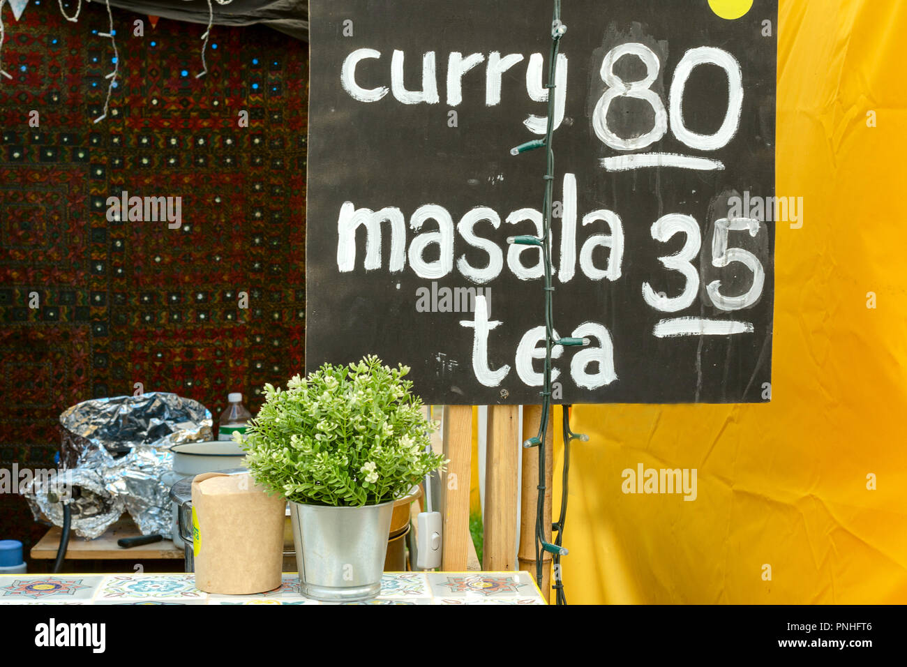 Selling curry, masala and tea in the restaurant. Advertising Sign ...