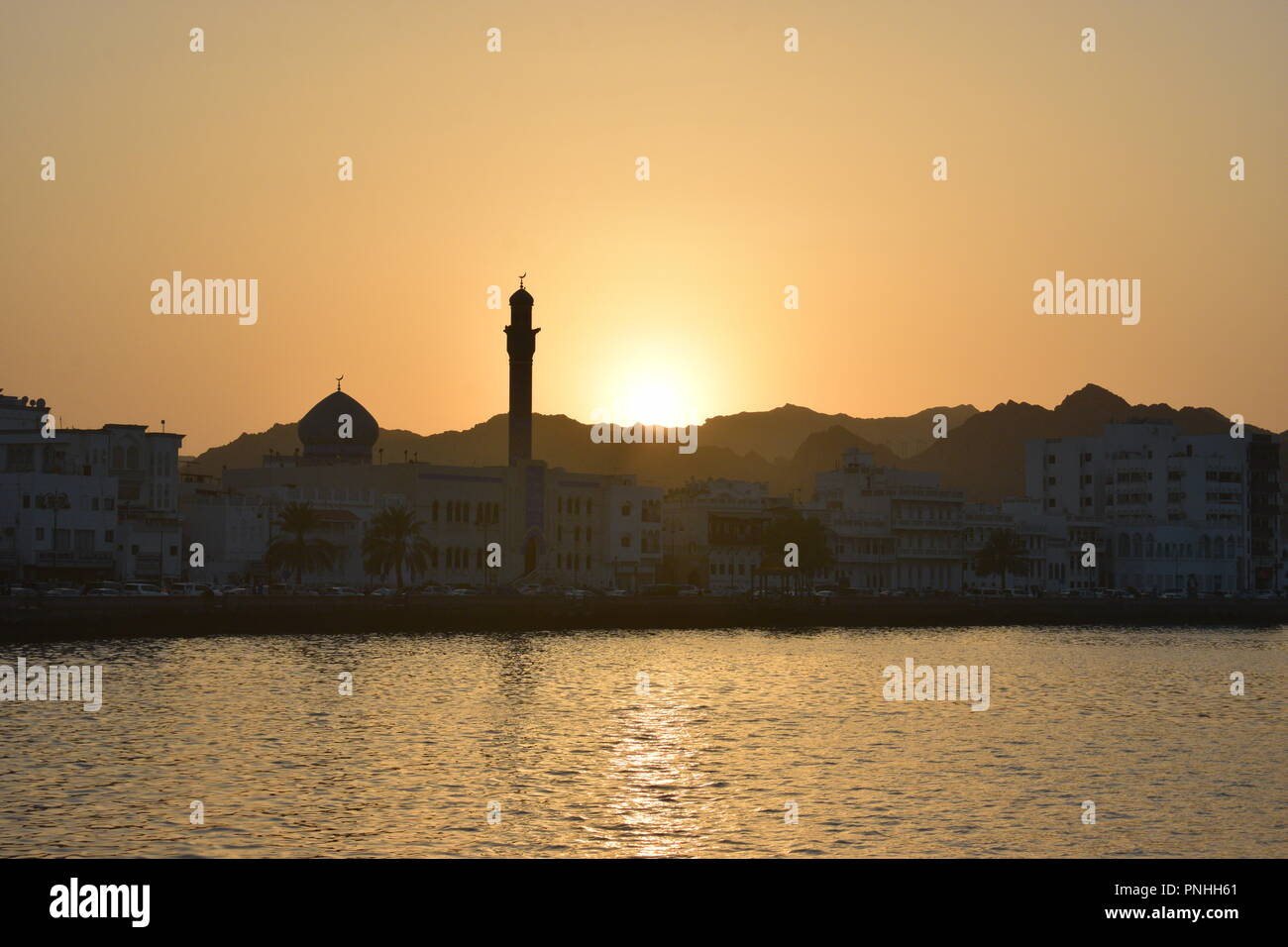 Sunset muscat corniche oman hi-res stock photography and images - Alamy