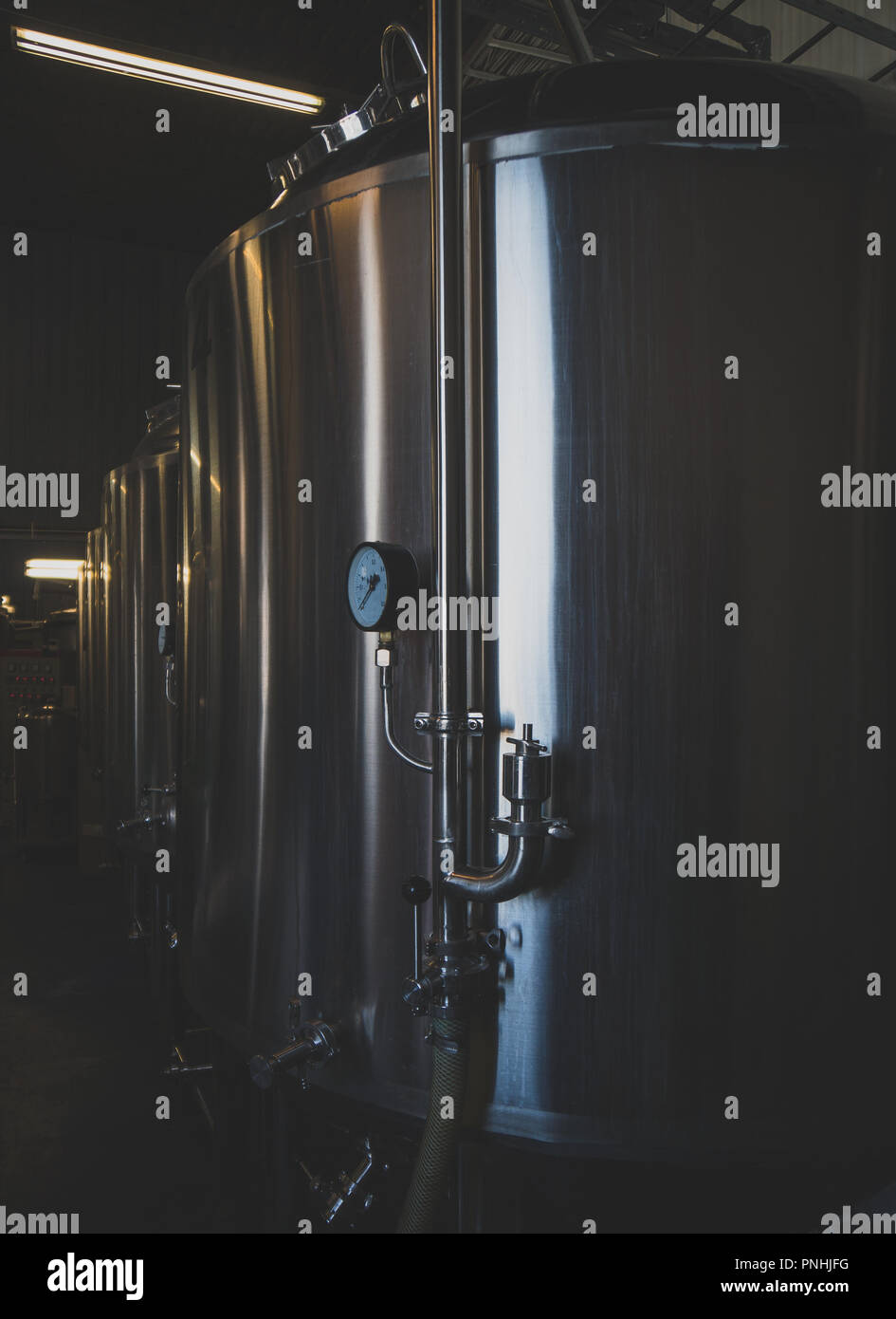 Stainless tanks for fermentation in a beer brewery Stock Photo - Alamy