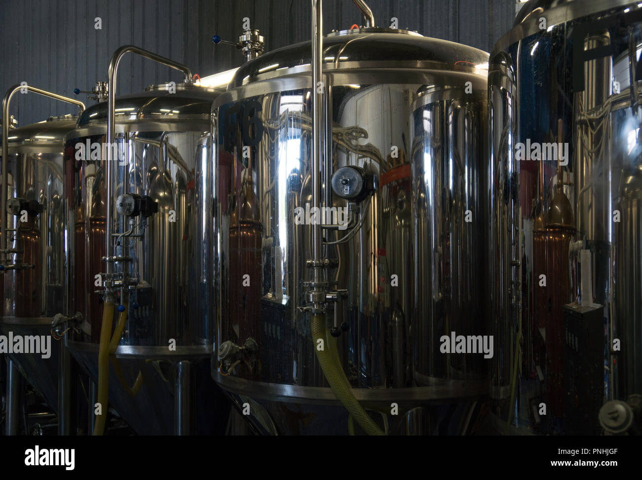 Stainless tanks for fermentation in a beer brewery Stock Photo - Alamy