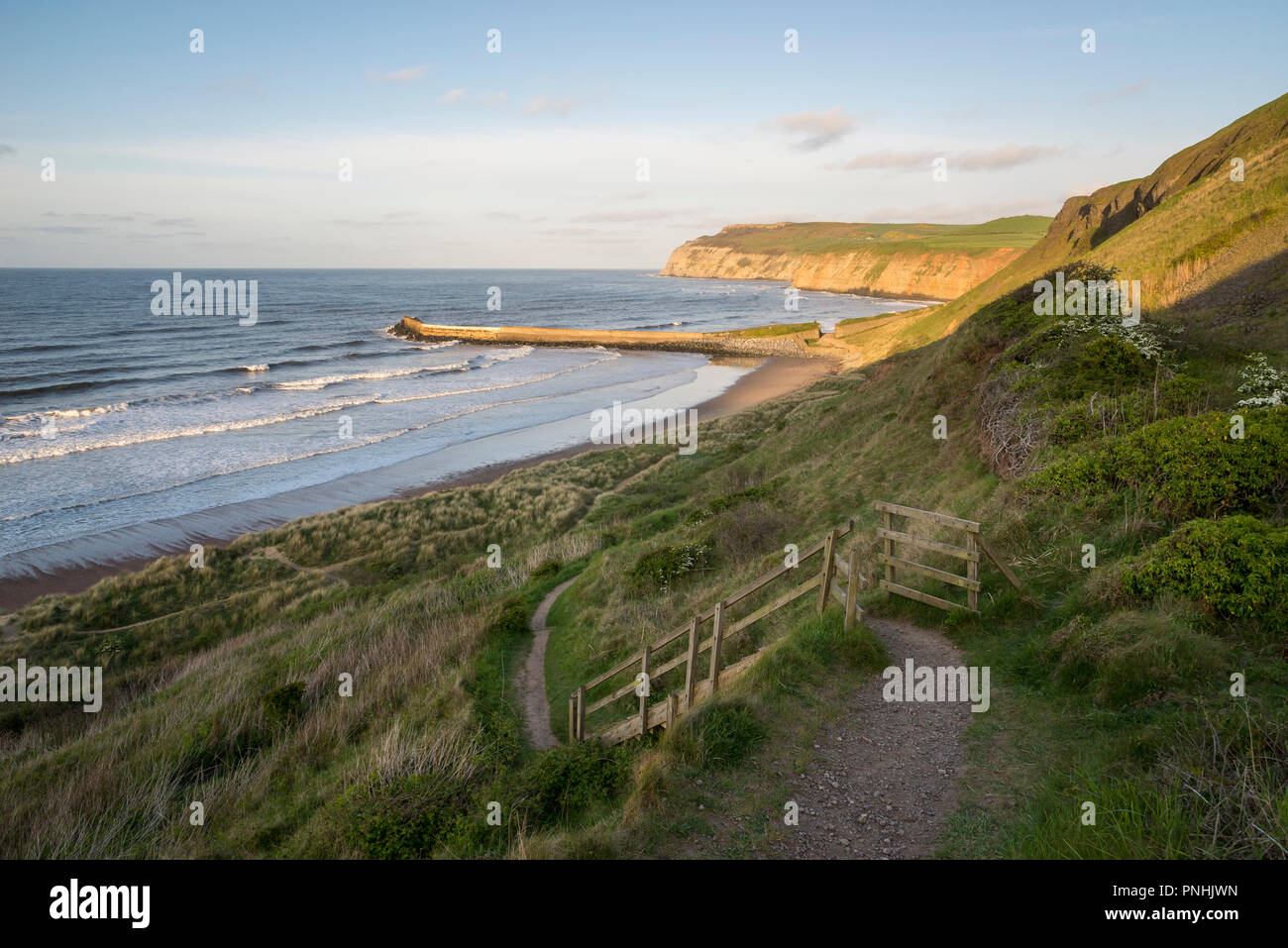 Section of the Cleveland Way coast path above Cattersty sands ...