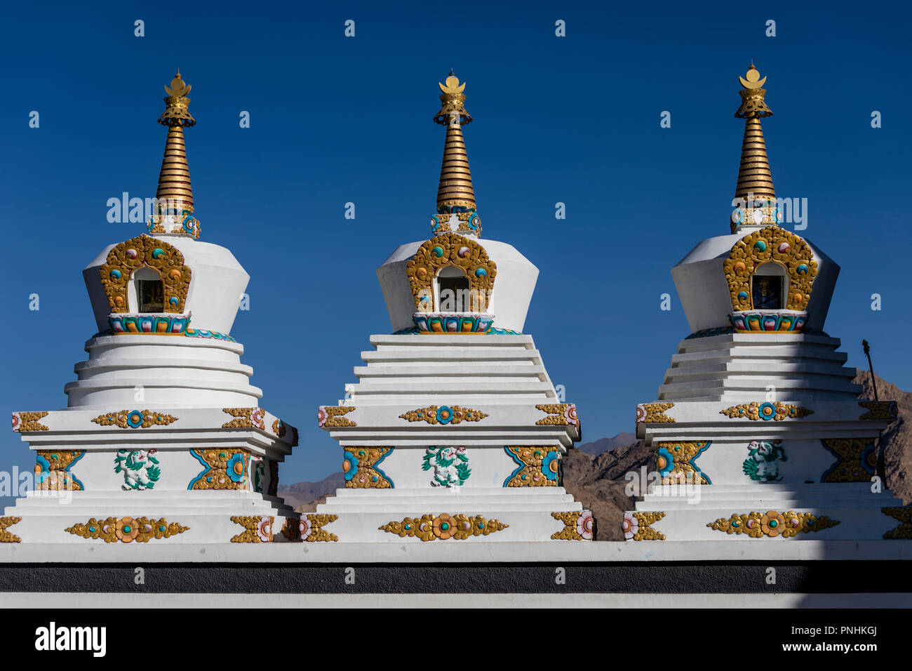 Close up of three Gompas outside the Thiksey monastery in Ladakh, India ...