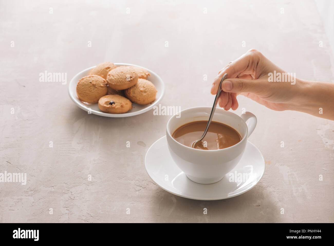 Hand stirring food hi-res stock photography and images - Alamy