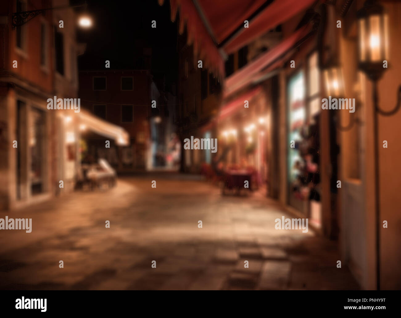 Old European night city abstract blurred background Stock Photo - Alamy