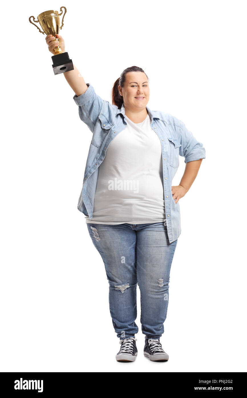 Full length portrait of an overweight woman holding a gold trophy cup ...