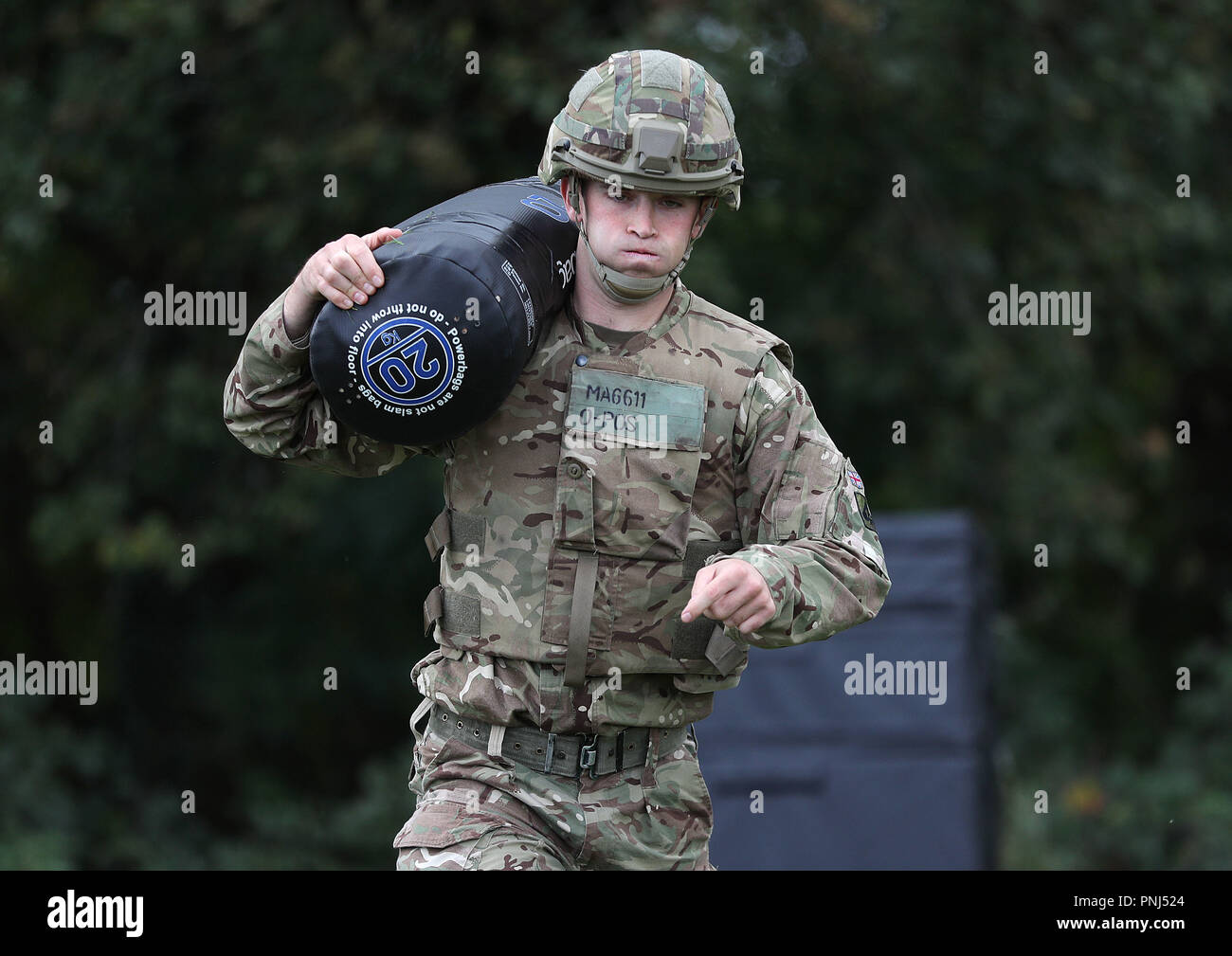 Soldiers demonstrate the repeated lift and carry stage in the British ...