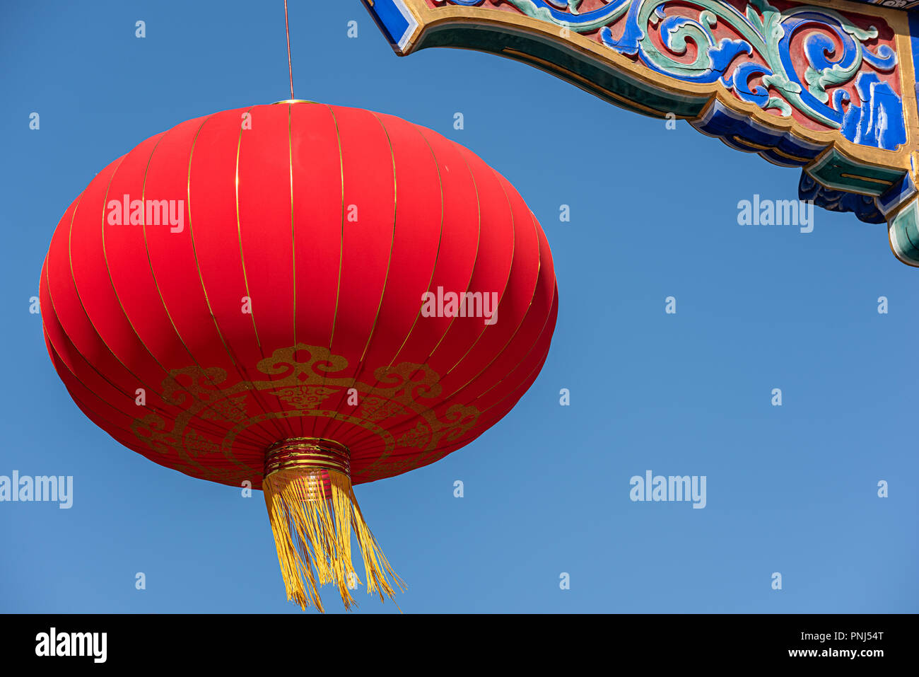 A big red lantern hanging in outside Stock Photo - Alamy