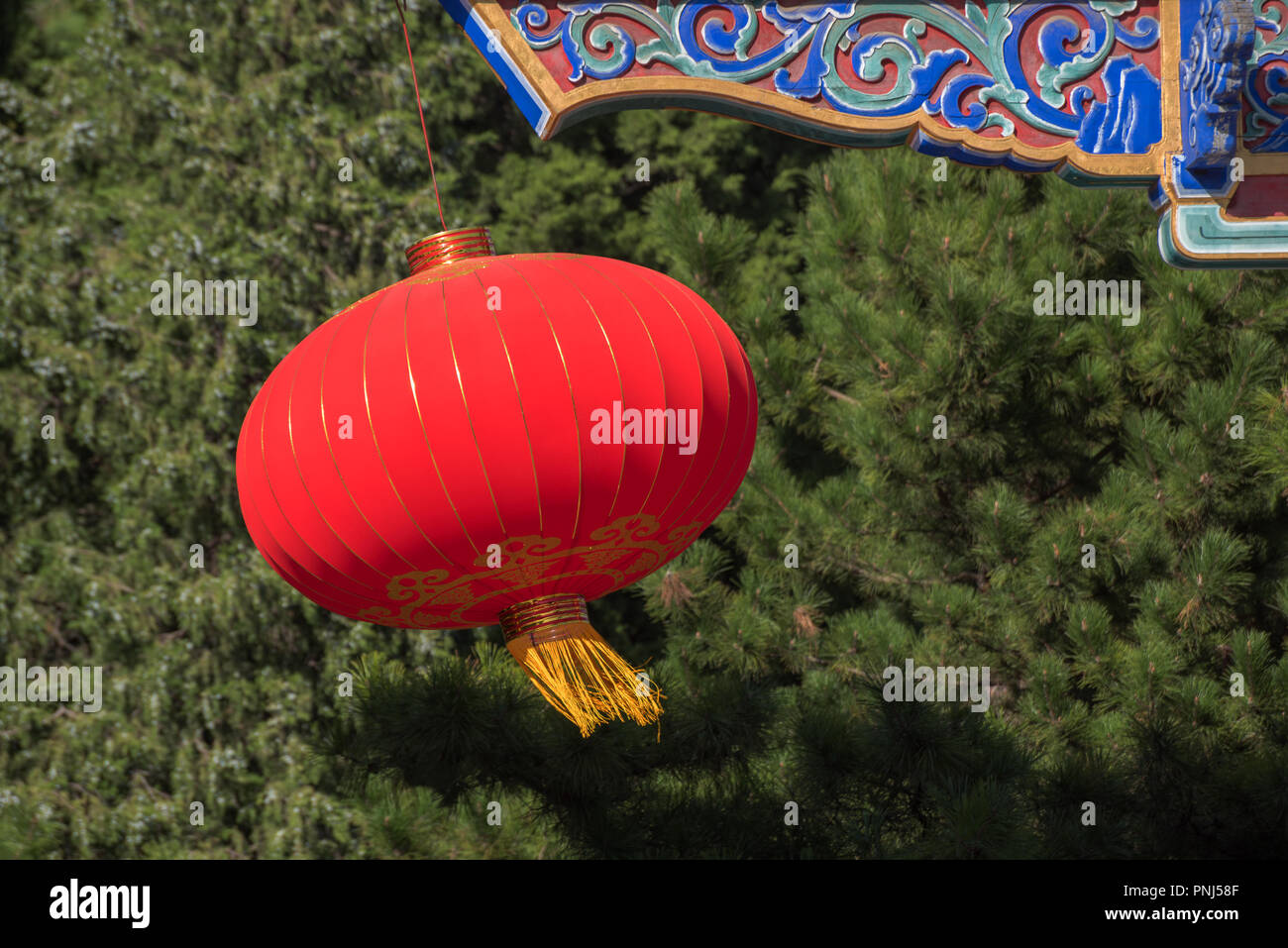 A big red lantern hanging in outside Stock Photo - Alamy