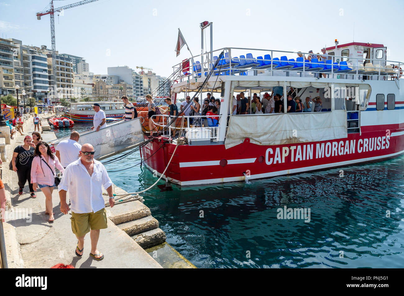 Ferries carrying passengers from Valletta to Sliema on the ...