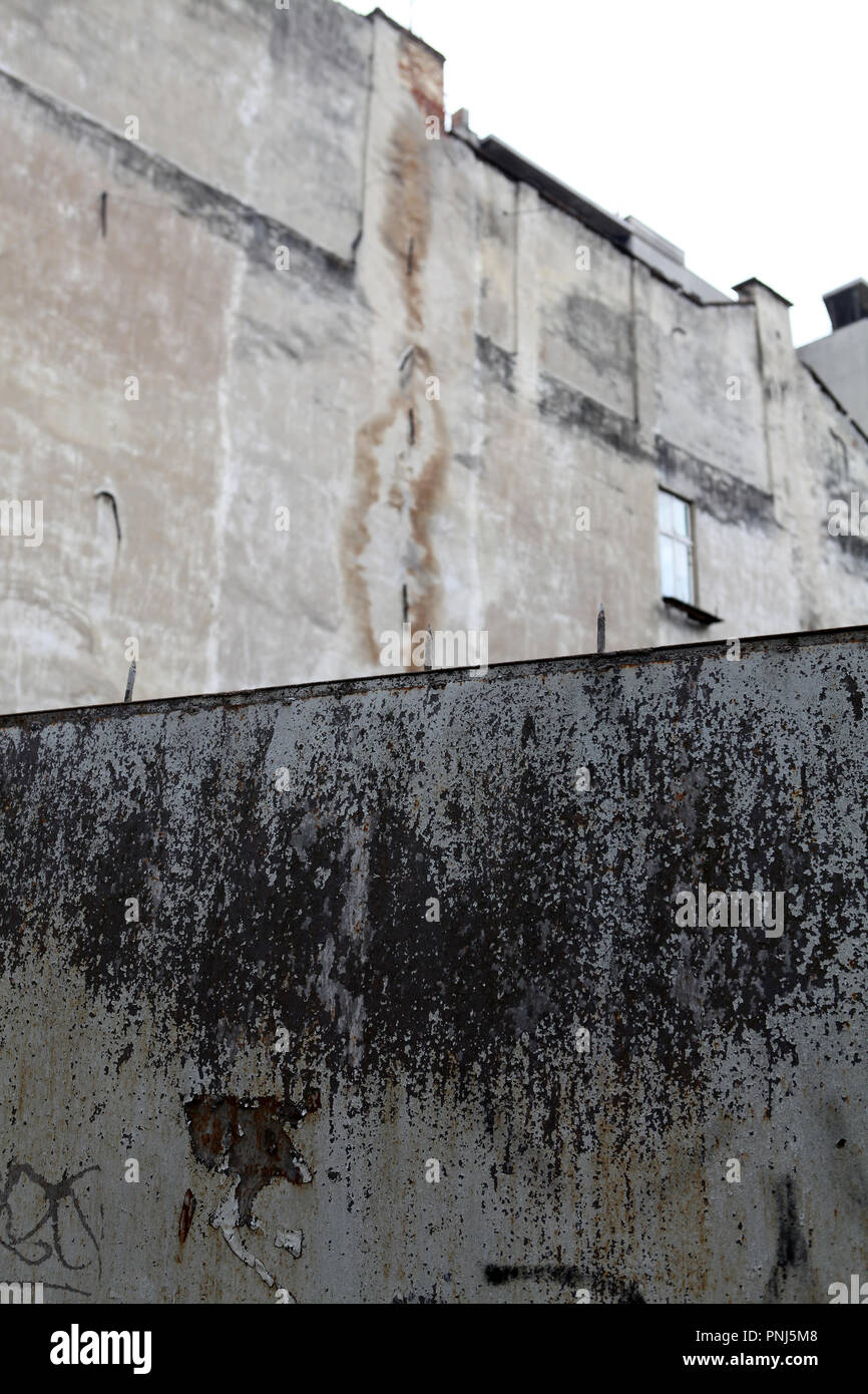 gray concrete wall in the dangerous district of the city Stock Photo ...
