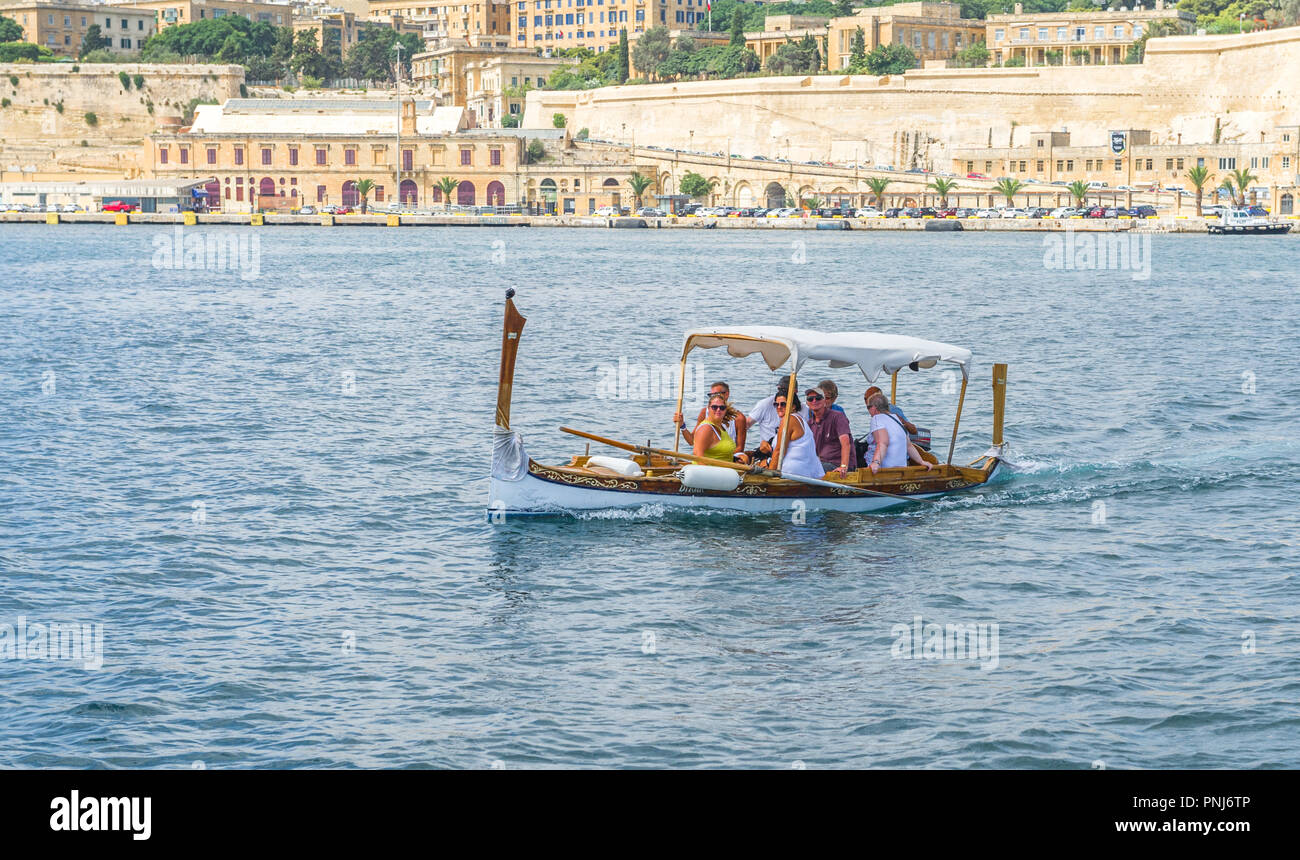 The Dgħajsa, a traditional Maltese water taxi Stock Photo - Alamy