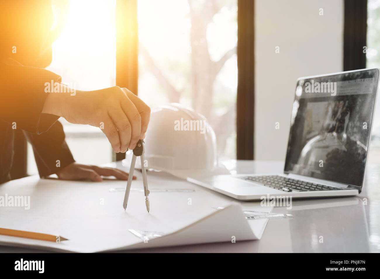 Engineer or Architect concept, Image of engineer drawing a blue print ...