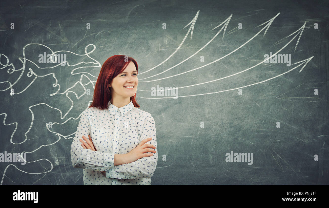 Concept of information processing as a concentrated redhead woman ...