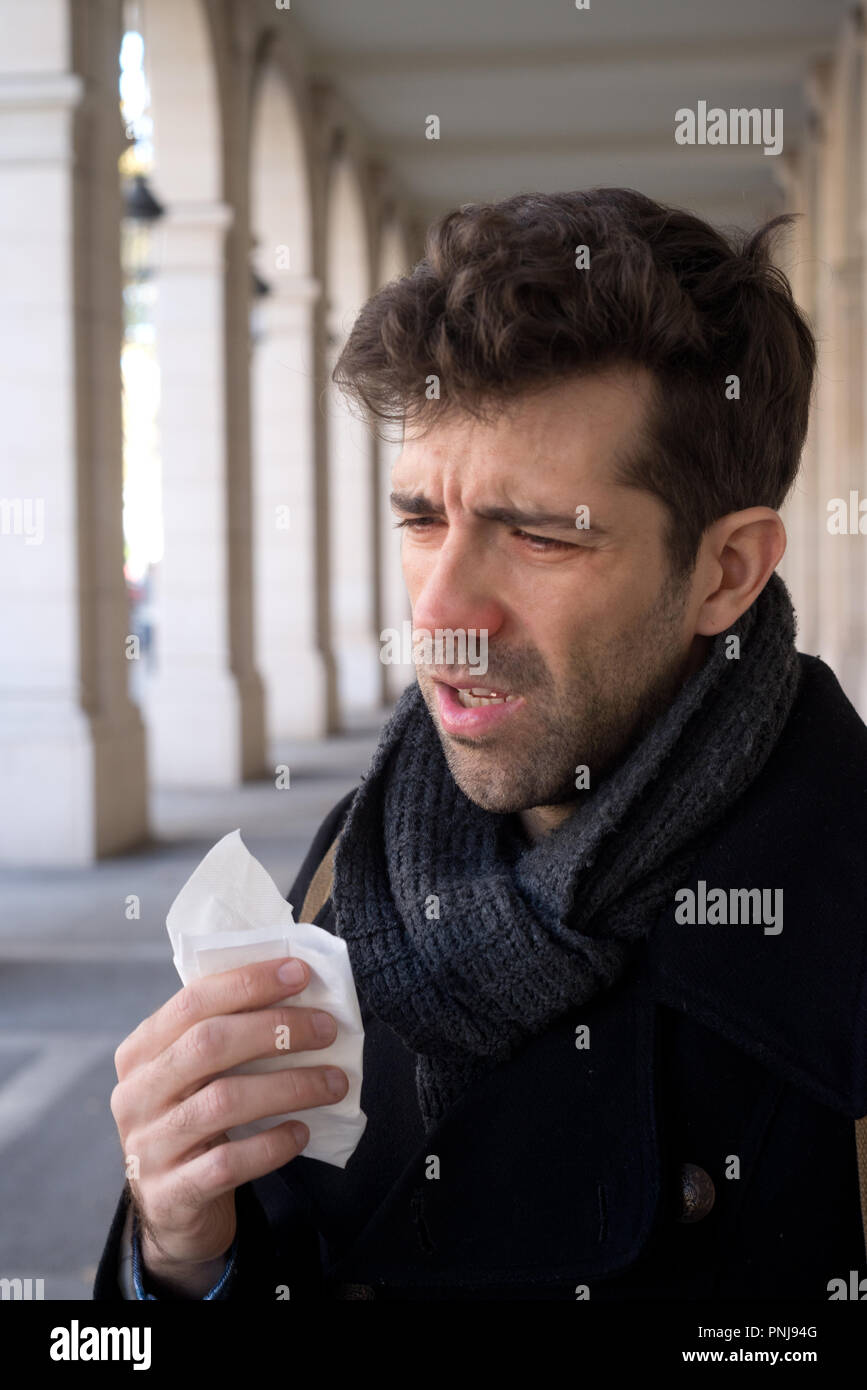 Man sneeze and handkerchief Stock Photo - Alamy