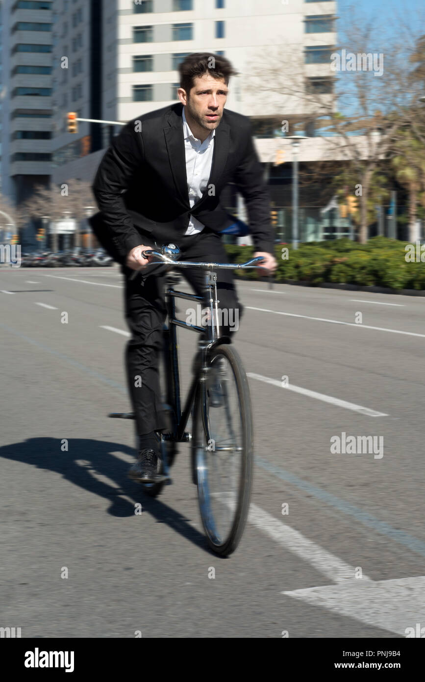 fastest man cycling in the city Stock Photo - Alamy